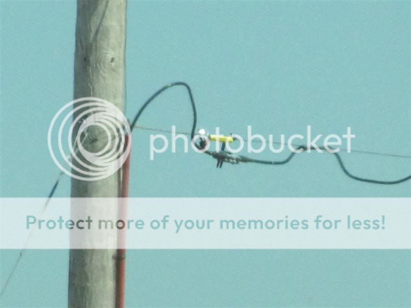 What line is this on the electric pole? It's arcing outside. Better ...